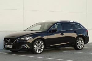 Black Mazda 6 2014 in Riga, with an engine capacity of 2.20 L and mileage of 188 thousand km for 7700 €, photo 5 on AUTOMOTO.COM.LV