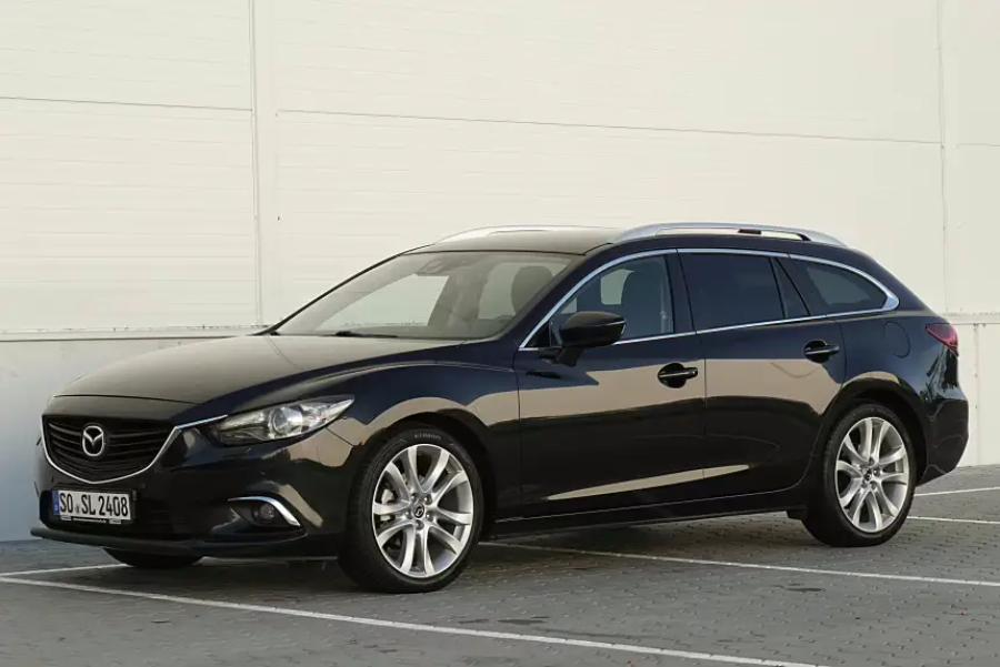Black Mazda 6 2014 in Riga, with an engine capacity of 2.20 L and mileage of 188 thousand km for 7700 €, photo 5 on AUTOMOTO.COM.LV