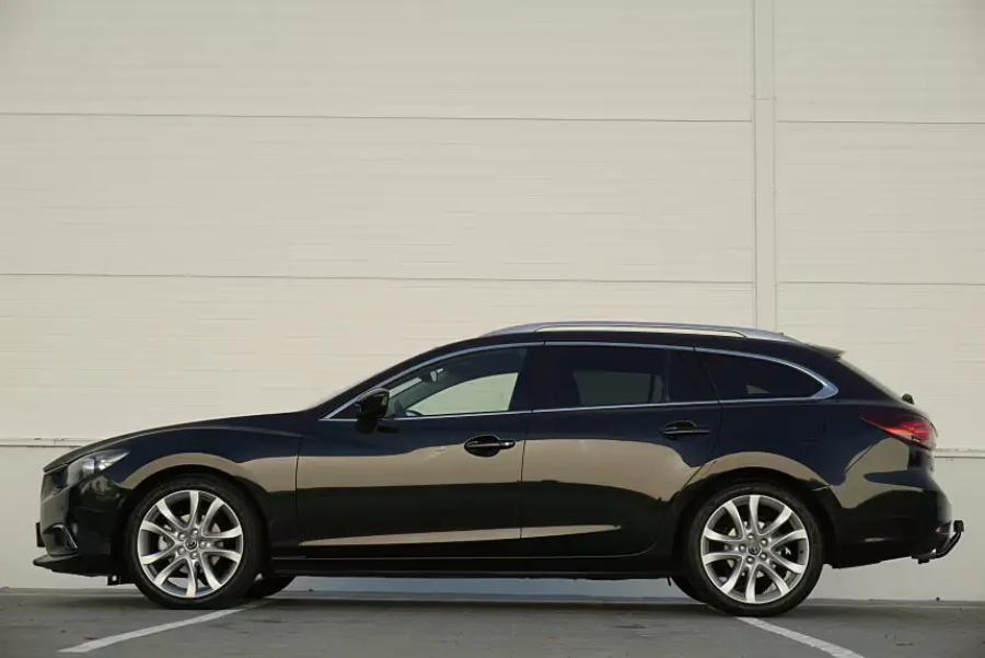 Black Mazda 6 2014 in Riga, with an engine capacity of 2.20 L and mileage of 188 thousand km for 7700 €, photo 6 on AUTOMOTO.COM.LV