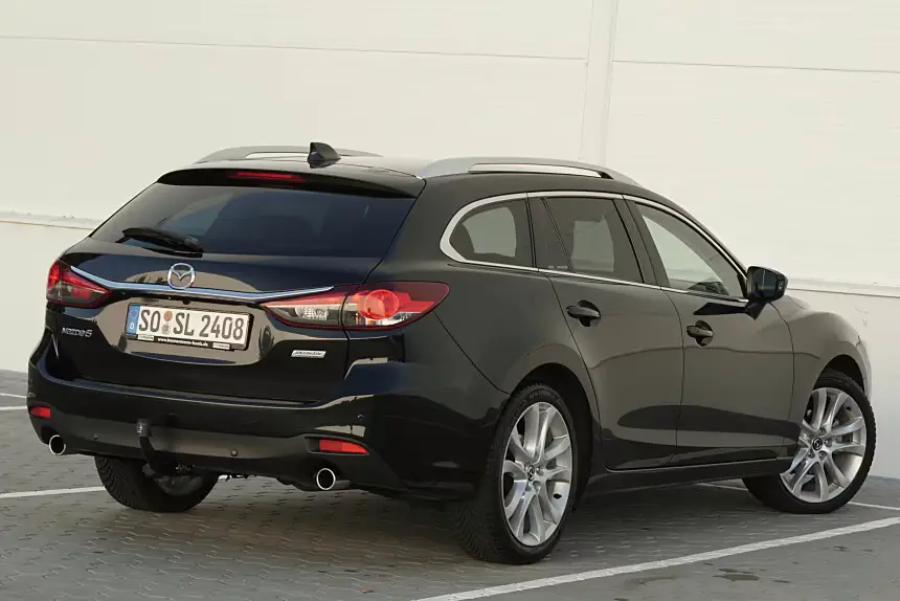Black Mazda 6 2014 in Riga, with an engine capacity of 2.20 L and mileage of 188 thousand km for 7700 €, photo 9 on AUTOMOTO.COM.LV