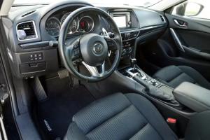 Black Mazda 6 2014 in Riga, with an engine capacity of 2.20 L and mileage of 188 thousand km for 7700 €, photo 16 on AUTOMOTO.COM.LV