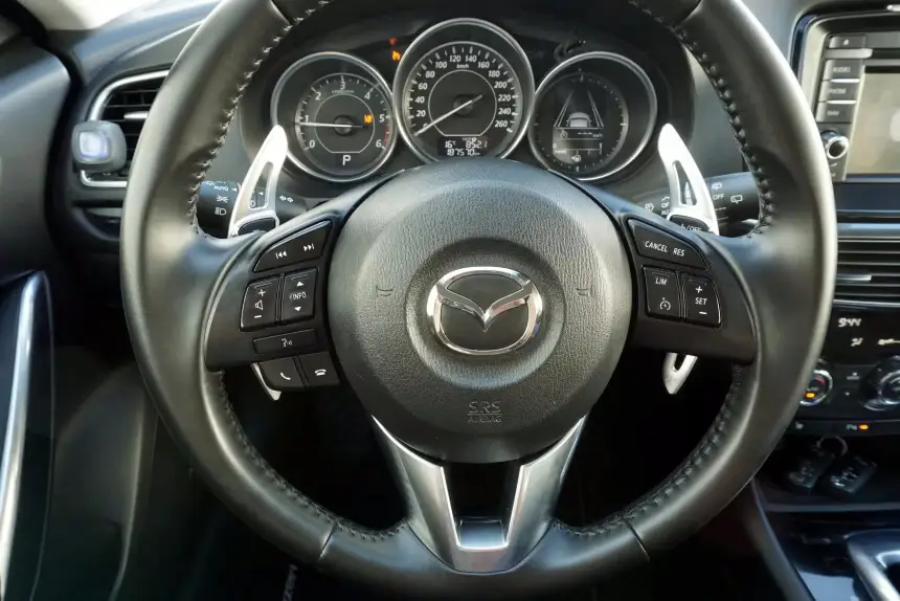 Black Mazda 6 2014 in Riga, with an engine capacity of 2.20 L and mileage of 188 thousand km for 7700 €, photo 17 on AUTOMOTO.COM.LV
