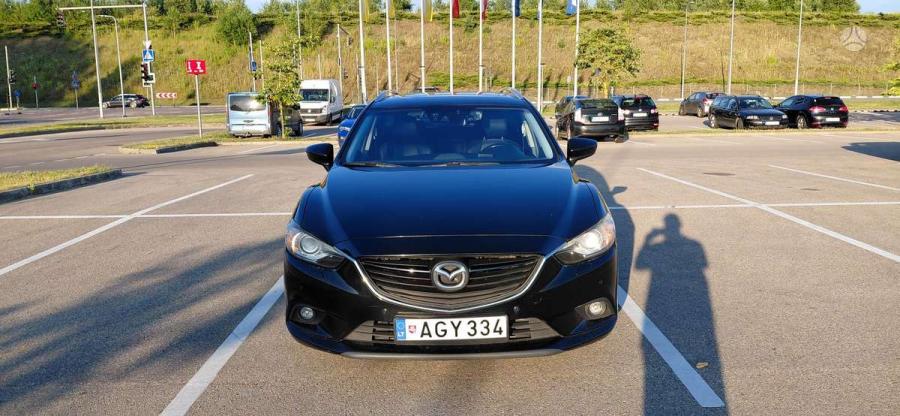 Black Mazda 6 2014 in Vilnius, with an engine capacity of 2.18 L and mileage of 168 thousand km for 6700 €, photo 4 on AUTOMOTO.COM.LV