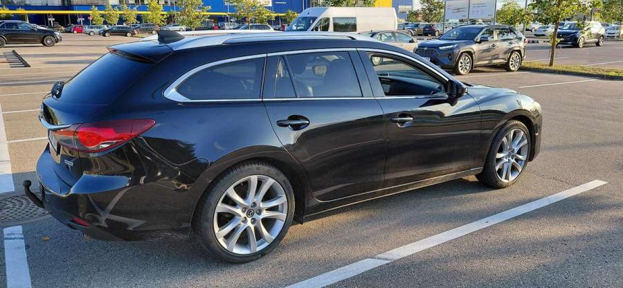 Black Mazda 6 2014 in Vilnius, with an engine capacity of 2.18 L and mileage of 168 thousand km for 6700 €, photo 5 on AUTOMOTO.COM.LV