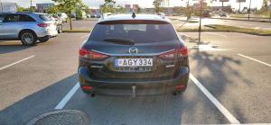 Black Mazda 6 2014 in Vilnius, with an engine capacity of 2.18 L and mileage of 168 thousand km for 6700 €, photo 6 on AUTOMOTO.COM.LV