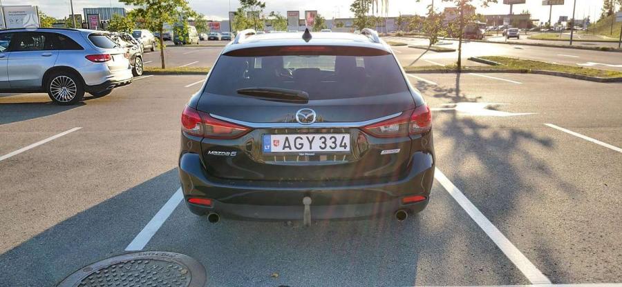Black Mazda 6 2014 in Vilnius, with an engine capacity of 2.18 L and mileage of 168 thousand km for 6700 €, photo 6 on AUTOMOTO.COM.LV