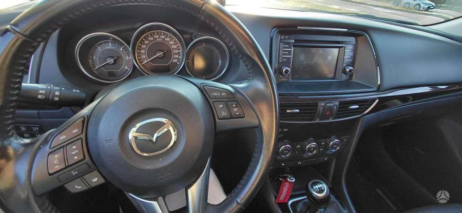 Black Mazda 6 2014 in Vilnius, with an engine capacity of 2.18 L and mileage of 168 thousand km for 6700 €, photo 17 on AUTOMOTO.COM.LV