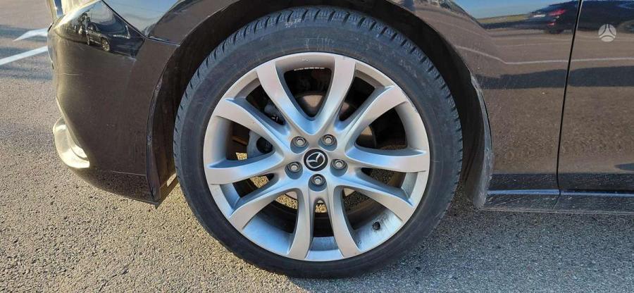 Black Mazda 6 2014 in Vilnius, with an engine capacity of 2.18 L and mileage of 168 thousand km for 6700 €, photo 21 on AUTOMOTO.COM.LV