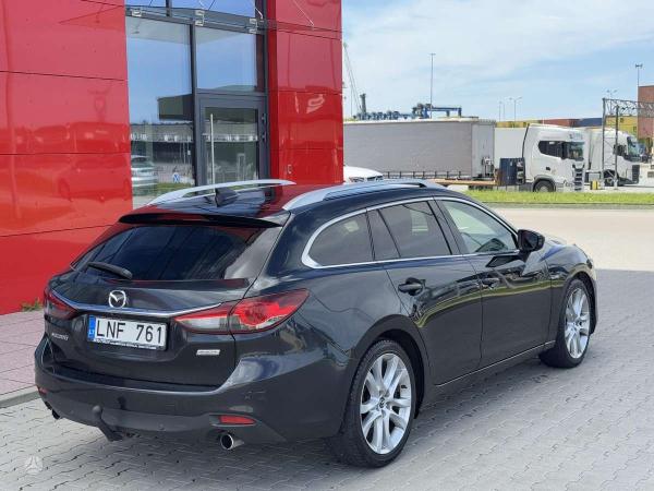 Black Mazda 6 2014 in Klaipeda, with an engine capacity of 2.18 L and mileage of 280 thousand km for 4950 €, photo 4 on AUTOMOTO.COM.LV