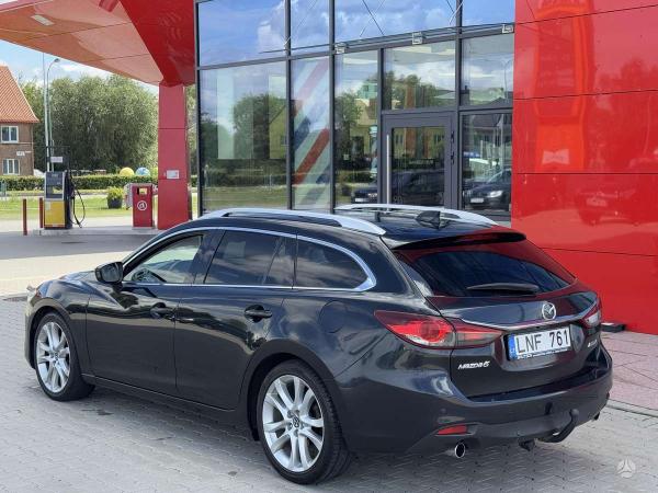 Black Mazda 6 2014 in Klaipeda, with an engine capacity of 2.18 L and mileage of 280 thousand km for 4950 €, photo 5 on AUTOMOTO.COM.LV