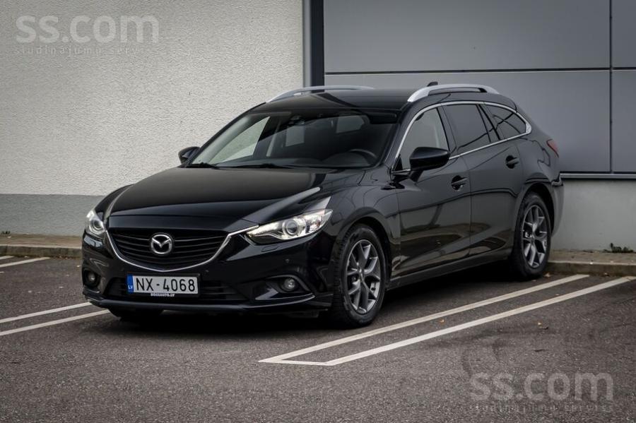 Black Mazda 6 2014 in Riga, with an engine capacity of 2.20 L and mileage of 237 thousand km for 5990 €, photo 1 on AUTOMOTO.COM.LV