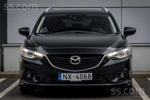 Black Mazda 6 2014 in Riga, with an engine capacity of 2.20 L and mileage of 237 thousand km for 5990 €, photo 5 on AUTOMOTO.COM.LV