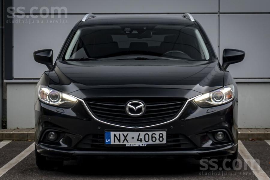 Black Mazda 6 2014 in Riga, with an engine capacity of 2.20 L and mileage of 237 thousand km for 5990 €, photo 5 on AUTOMOTO.COM.LV