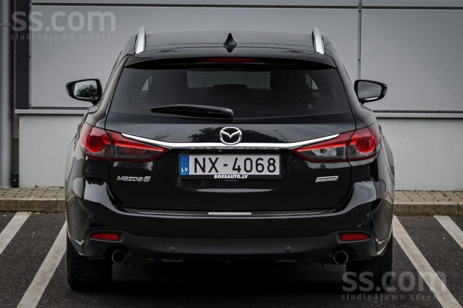 Black Mazda 6 2014 in Riga, with an engine capacity of 2.20 L and mileage of 237 thousand km for 5990 €, photo 11 on AUTOMOTO.COM.LV