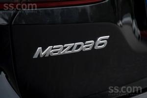 Black Mazda 6 2014 in Riga, with an engine capacity of 2.20 L and mileage of 237 thousand km for 5990 €, photo 15 on AUTOMOTO.COM.LV