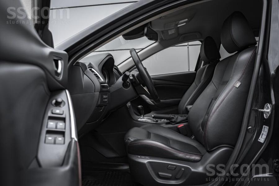 Black Mazda 6 2014 in Riga, with an engine capacity of 2.20 L and mileage of 237 thousand km for 5990 €, photo 20 on AUTOMOTO.COM.LV