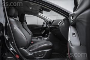 Black Mazda 6 2014 in Riga, with an engine capacity of 2.20 L and mileage of 237 thousand km for 5990 €, photo 22 on AUTOMOTO.COM.LV