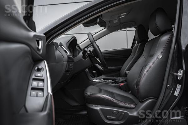 Black Mazda 6 2014 in Riga, with an engine capacity of 2.20 L and mileage of 237 thousand km for 5990 €, photo 11 on AUTOMOTO.COM.LV
