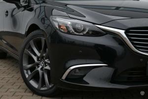 Black Mazda 6 2015 in Kretinga, with an engine capacity of 2.18 L and mileage of 178 thousand km for 8499 €, photo 7 on AUTOMOTO.COM.LV