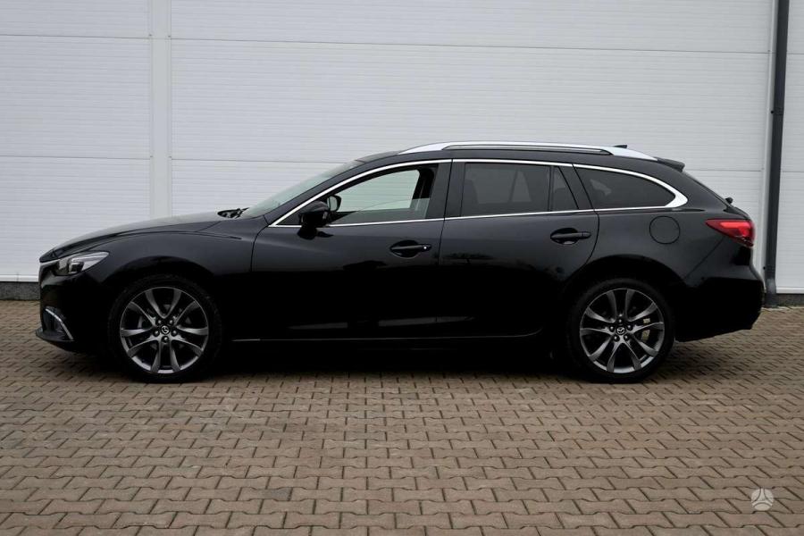 Black Mazda 6 2015 in Kretinga, with an engine capacity of 2.18 L and mileage of 178 thousand km for 8499 €, photo 13 on AUTOMOTO.COM.LV