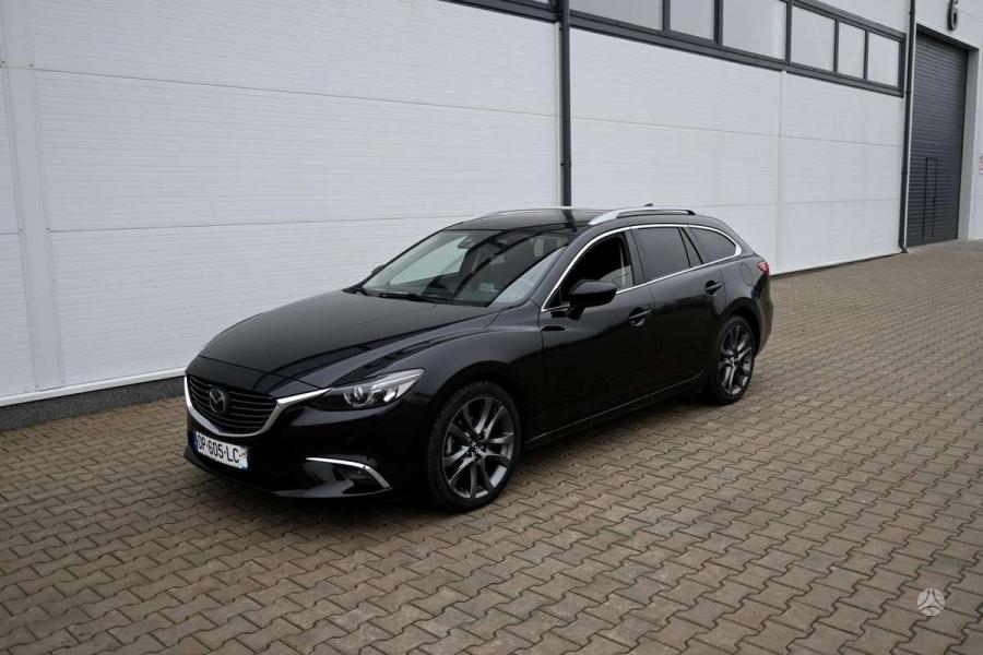 Black Mazda 6 2015 in Kretinga, with an engine capacity of 2.18 L and mileage of 178 thousand km for 8499 €, photo 14 on AUTOMOTO.COM.LV