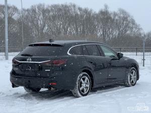 Black Mazda 6 2015 in Taurage, with an engine capacity of 2.20 L and mileage of 304 thousand km for 5999 €, photo 6 on AUTOMOTO.COM.LV