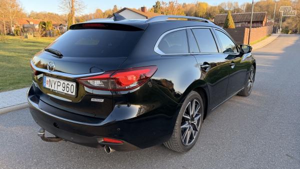 Black Mazda 6 2015 in Kaunas, with an engine capacity of 2.20 L and mileage of 227 thousand km for 8500 €, photo 5 on AUTOMOTO.COM.LV