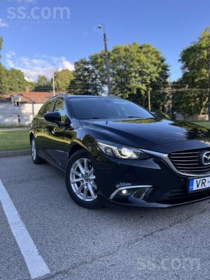 Black Mazda 6 2015 in Riga, with an engine capacity of 2.20 L and mileage of 167 thousand km for 7250 €, photo 4 on AUTOMOTO.COM.LV