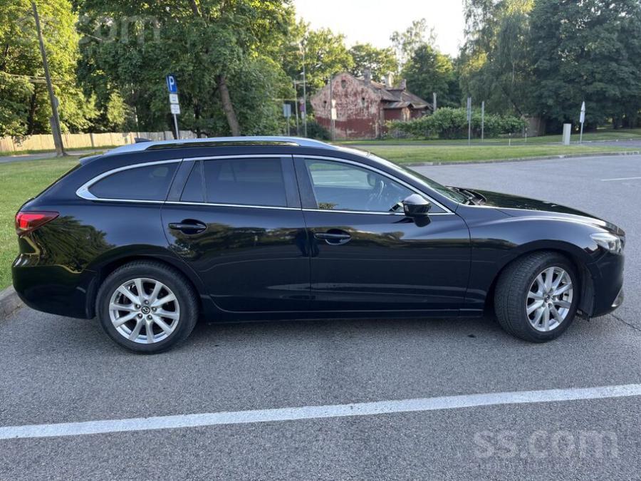 Black Mazda 6 2015 in Riga, with an engine capacity of 2.20 L and mileage of 167 thousand km for 7250 €, photo 5 on AUTOMOTO.COM.LV