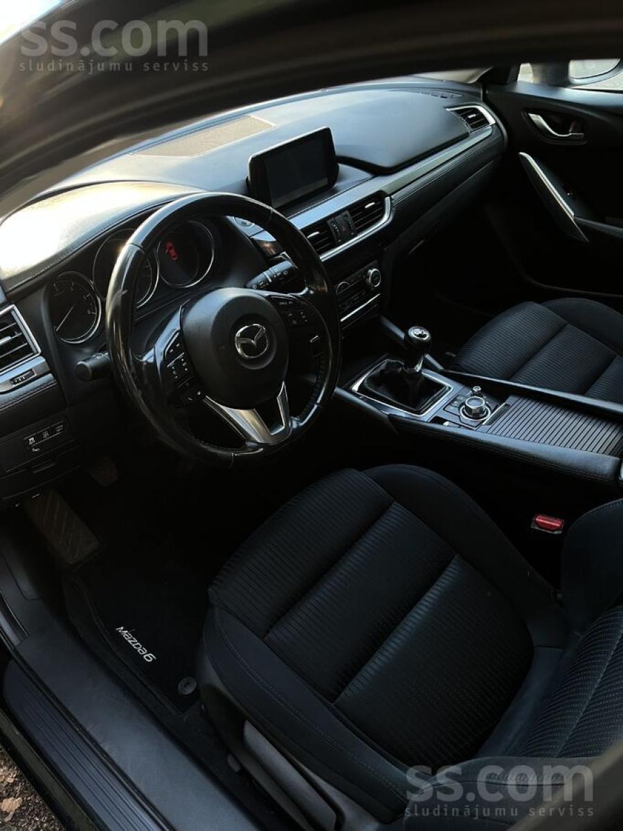 Black Mazda 6 2015 in Riga, with an engine capacity of 2.20 L and mileage of 167 thousand km for 7250 €, photo 13 on AUTOMOTO.COM.LV