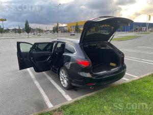 Black Mazda 6 2015 in Riga, with an engine capacity of 2.20 L and mileage of 245 thousand km for 5900 €, photo 5 on AUTOMOTO.COM.LV