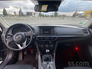 Black Mazda 6 2015 in Riga, with an engine capacity of 2.20 L and mileage of 245 thousand km for 5900 €, photo 6 on AUTOMOTO.COM.LV