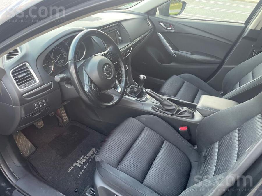 Black Mazda 6 2015 in Riga, with an engine capacity of 2.20 L and mileage of 245 thousand km for 5900 €, photo 9 on AUTOMOTO.COM.LV