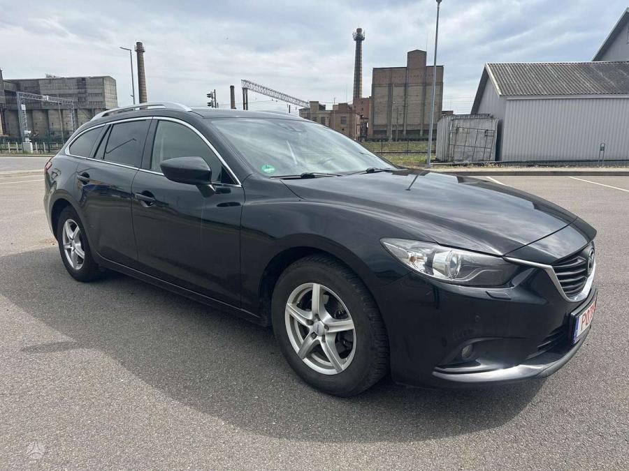 Black Mazda 6 2015 in Kaunas, with an engine capacity of 2.18 L and mileage of 246 thousand km for 3990 €, photo 4 on AUTOMOTO.COM.LV