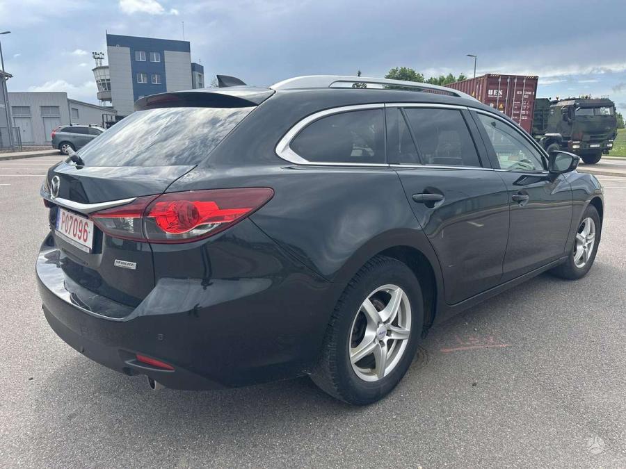 Black Mazda 6 2015 in Kaunas, with an engine capacity of 2.18 L and mileage of 246 thousand km for 3990 €, photo 6 on AUTOMOTO.COM.LV