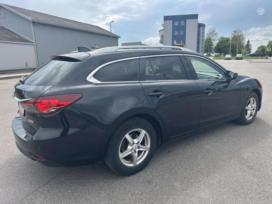Black Mazda 6 2015 in Kaunas, with an engine capacity of 2.18 L and mileage of 246 thousand km for 3990 €, photo 12 on AUTOMOTO.COM.LV