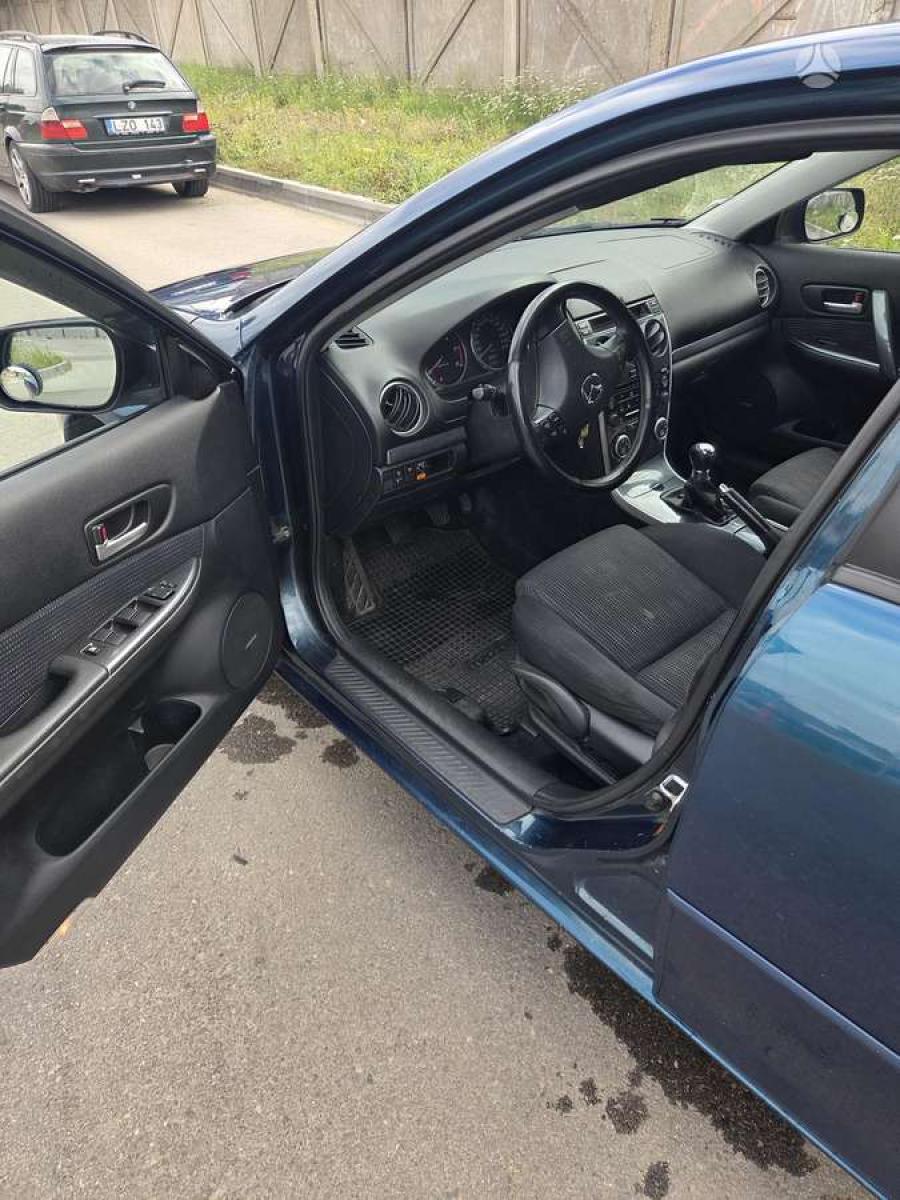 Blue Mazda 6 2007 in Klaipeda, with an engine capacity of 2.00 L and mileage of 290 thousand km for 950 €, photo 6 on AUTOMOTO.COM.LV
