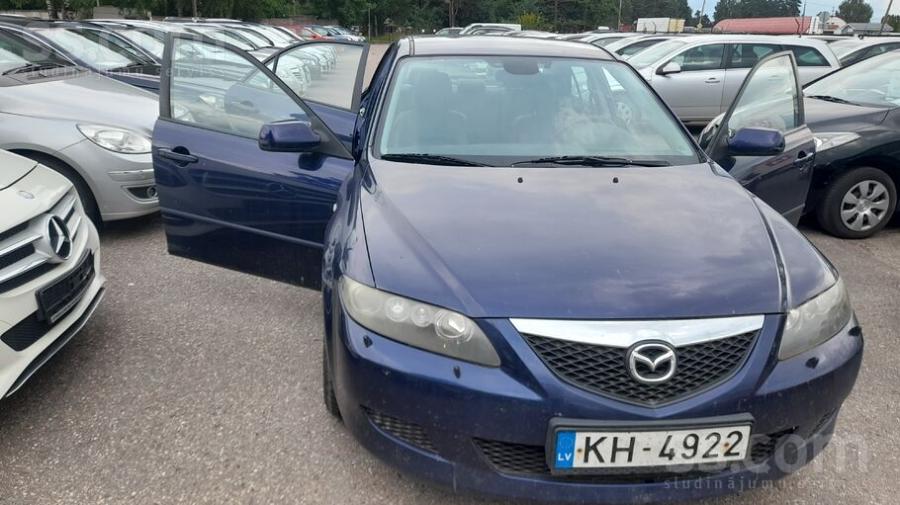 Blue Mazda 6 2003 in Riga, with an engine capacity of 2.20 L and mileage of 299 thousand km for 500 €, photo 32 on AUTOMOTO.COM.LV