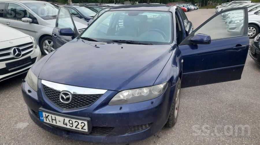 Blue Mazda 6 2003 in Riga, with an engine capacity of 2.20 L and mileage of 299 thousand km for 500 €, photo 33 on AUTOMOTO.COM.LV