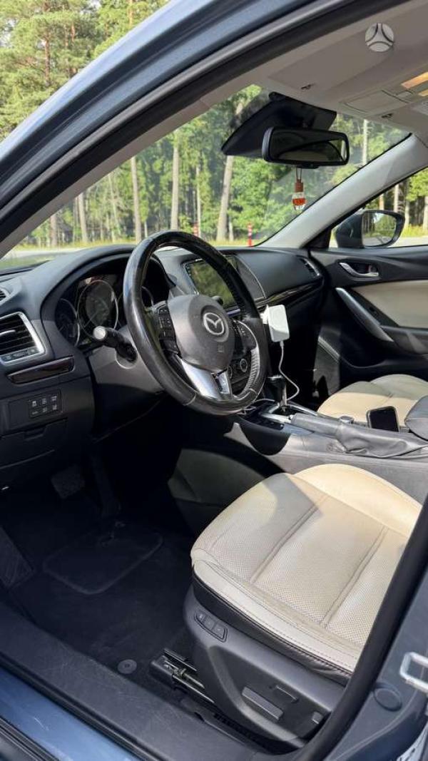 Blue Mazda 6 2013 in Klaipeda, with an engine capacity of 2.19 L and mileage of 209 thousand km for 6900 €, photo 7 on AUTOMOTO.COM.LV