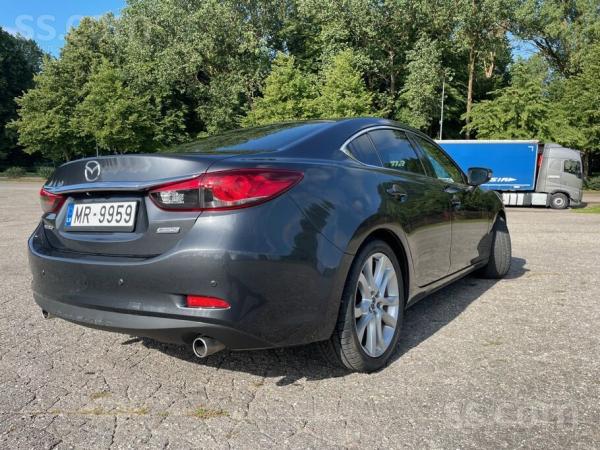 Blue Mazda 6 2014 in Liepaja, with an engine capacity of 2.20 L and mileage of 196 thousand km for 7500 €, photo 11 on AUTOMOTO.COM.LV