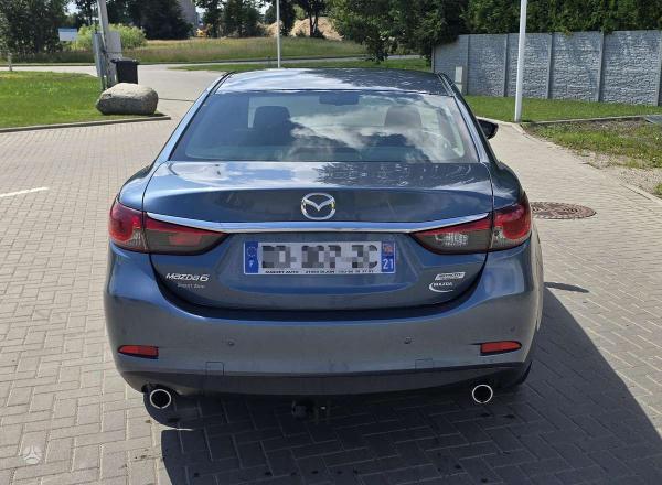 Blue Mazda 6 2014 in Taurage, with an engine capacity of 2.18 L and mileage of 193 thousand km for 4800 €, photo 8 on AUTOMOTO.COM.LV