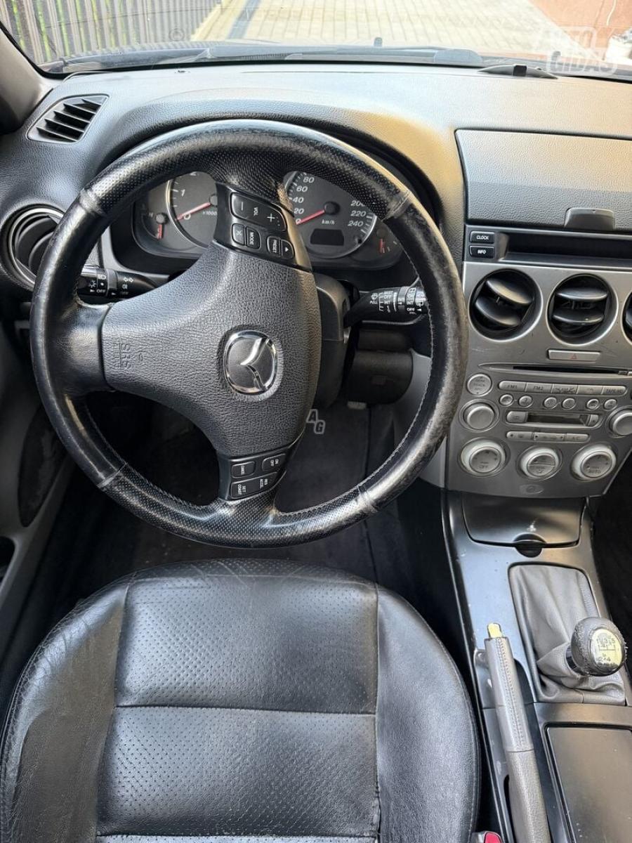 Blue Mazda 6 2003 in Panevezys, with an engine capacity of 2.00 L and mileage of 342 thousand km for 850 €, photo 11 on AUTOMOTO.COM.LV