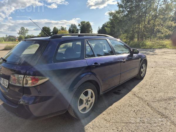 Blue Mazda 6 2006 in Jekabpils, with an engine capacity of 2.00 L and mileage of 223 thousand km for 990 €, photo 7 on AUTOMOTO.COM.LV
