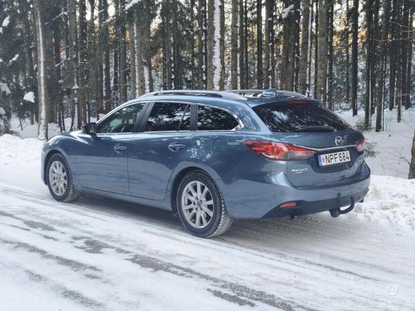 Blue Mazda 6 2013 in Plunge, with an engine capacity of 2.20 L and mileage of 287 thousand km for 4900 €, photo 5 on AUTOMOTO.COM.LV