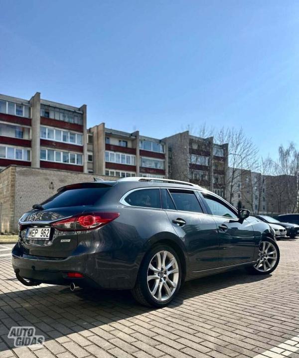 Blue Mazda 6 2013 in Panevezys, with an engine capacity of 2.20 L and mileage of 259 thousand km for 5300 €, photo 4 on AUTOMOTO.COM.LV