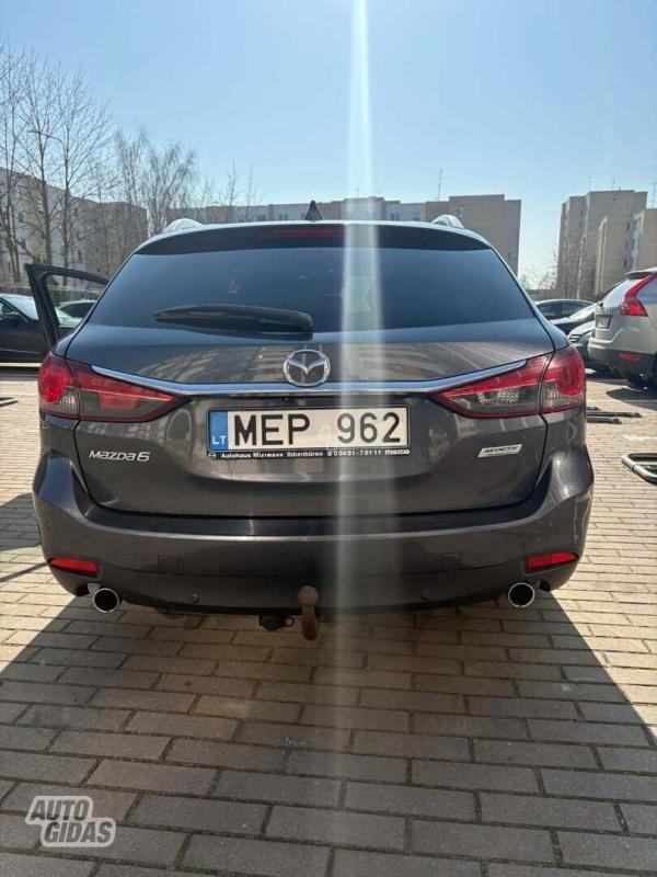 Blue Mazda 6 2013 in Panevezys, with an engine capacity of 2.20 L and mileage of 259 thousand km for 5300 €, photo 7 on AUTOMOTO.COM.LV