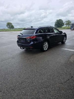 Blue Mazda 6 2013 in Marijampole, with an engine capacity of 2.18 L and mileage of 233 thousand km for 4350 €, photo 9 on AUTOMOTO.COM.LV