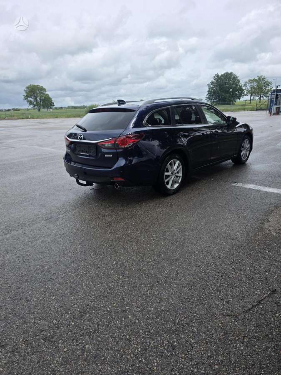Blue Mazda 6 2013 in Marijampole, with an engine capacity of 2.18 L and mileage of 233 thousand km for 4350 €, photo 9 on AUTOMOTO.COM.LV
