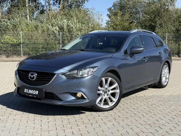 Blue Mazda 6 2013 in Marijampole, with an engine capacity of 2.18 L and mileage of 238 thousand km for 5100 €, photo 3 on AUTOMOTO.COM.LV